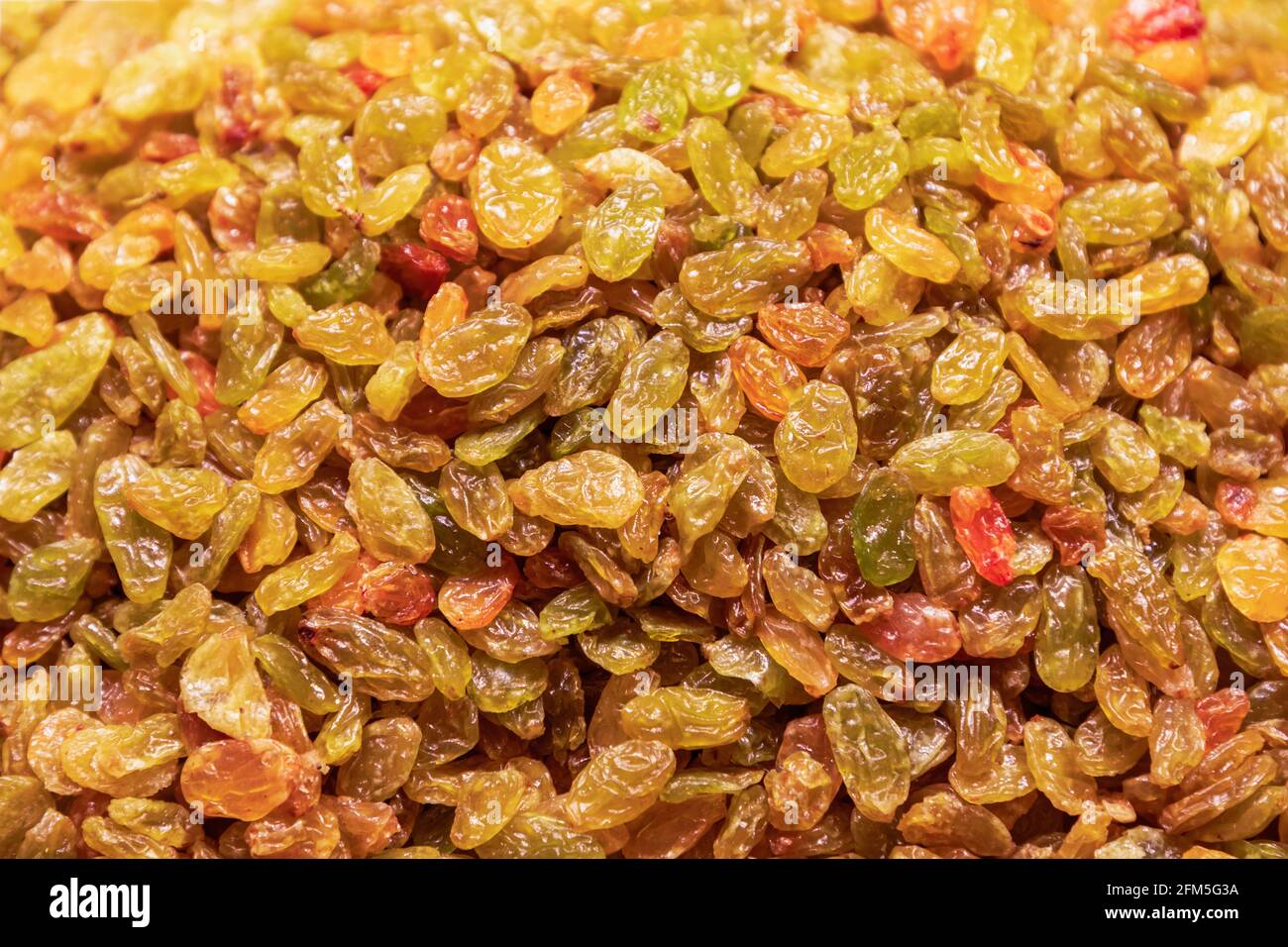 A heap of yellow raisins for background (Selective focus Stock Photo ...