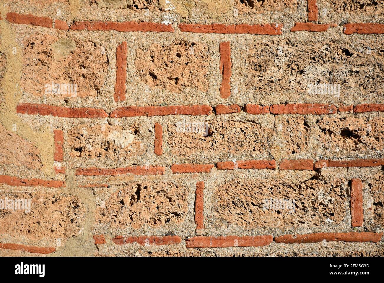 Byzantine church handcrafted red clay tile and stone exterior wall of ...