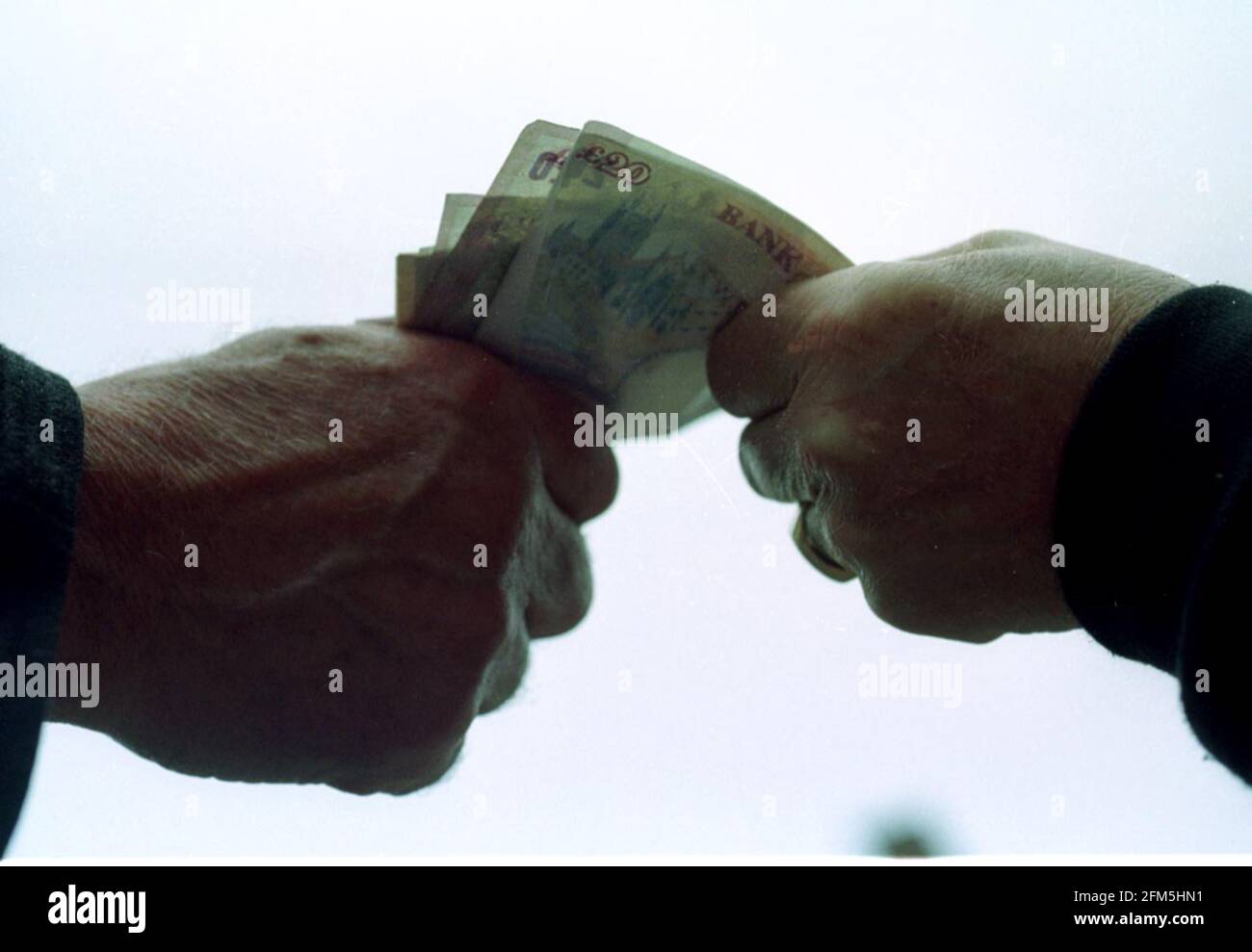 Money handed over hi-res stock photography and images - Alamy