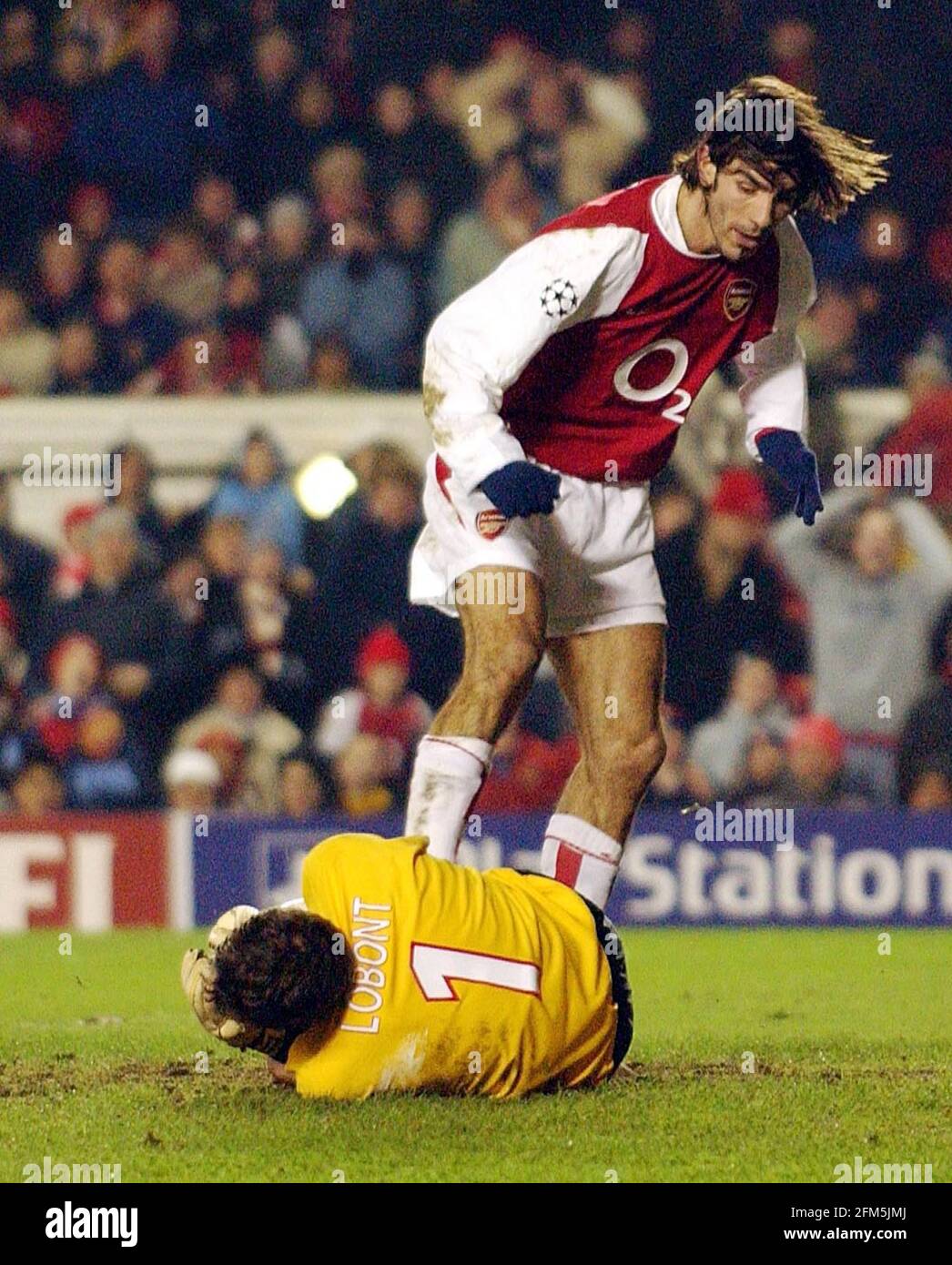 CHAMPIONS LEAGUE ARSENAL V AJAX PIRES KICKS THE GOAL KEEPER AND IS ...