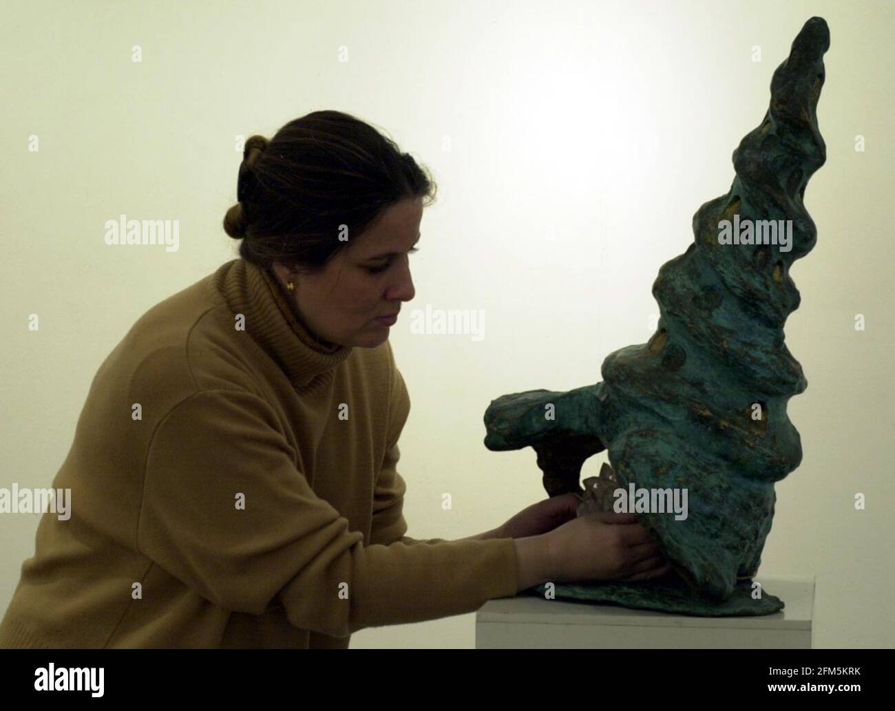 Portugese artist Felippa Lobato (right) December 2000 setting up her ...