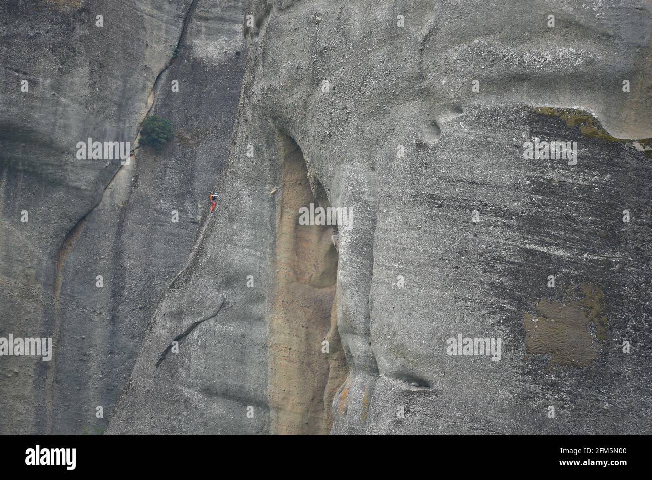 Landscape with view of an ancient rock ascetic cave in Meteora ...