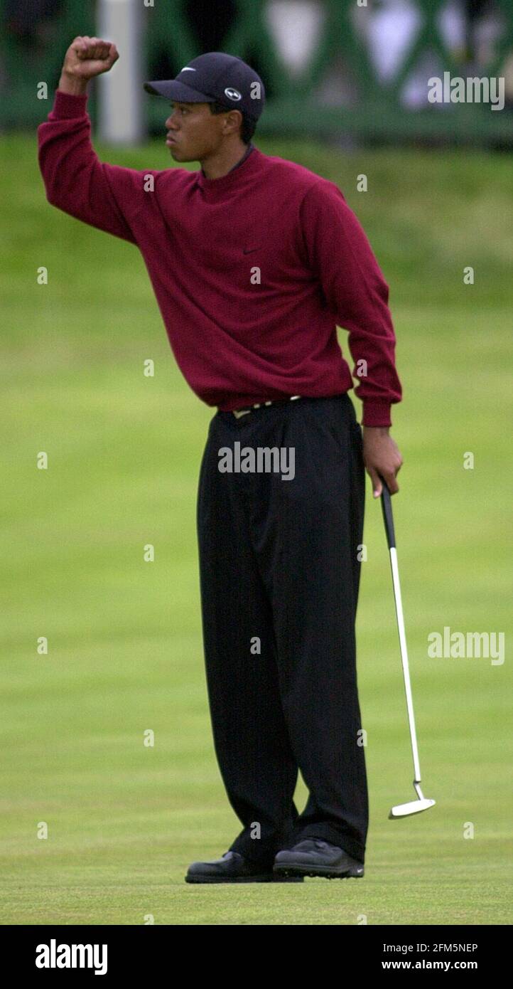 Tiger Woods Golfer of the USA, July 2000 on the 18th green, punches the ...