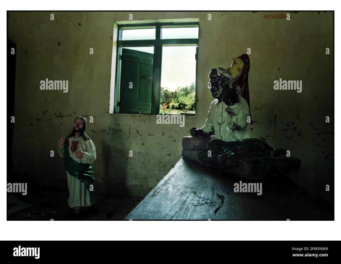 Mass Suicide Cult in Kanungu Uganda April 2000 Slightly damaged christ ...