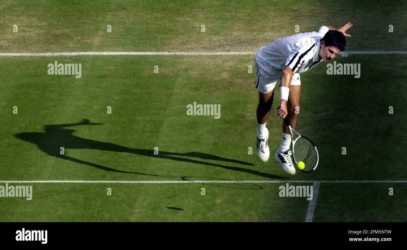 Tim henman stretches ball hi-res stock photography and images - Alamy