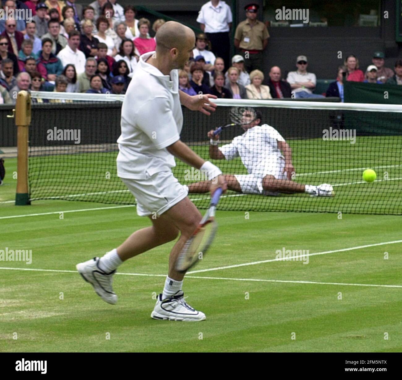 Andre Agassi in action against Mark Phillippoussis July 2000 in their ...