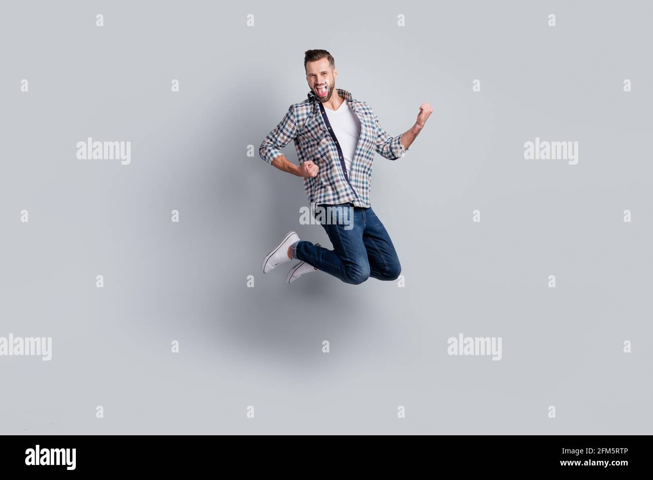 Full length body size view of attractive cheerful crazy guy jumping ...