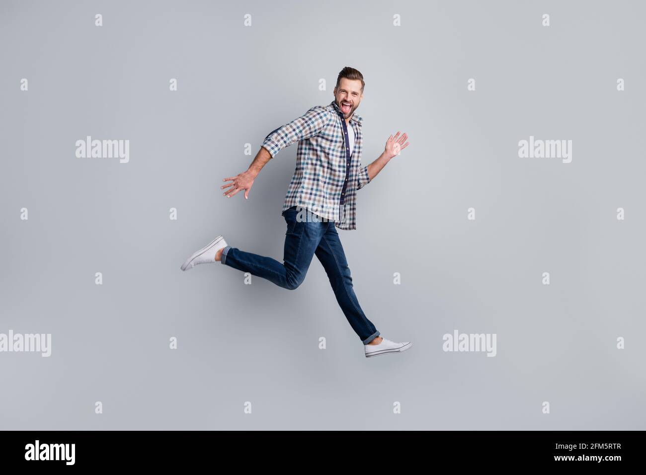 Full length body size view of attractive funky cheerful guy jumping ...