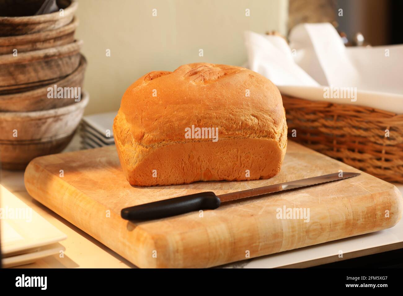 Freshly baked bread made in a kitchen in a pub in West Sussex, UK Stock ...