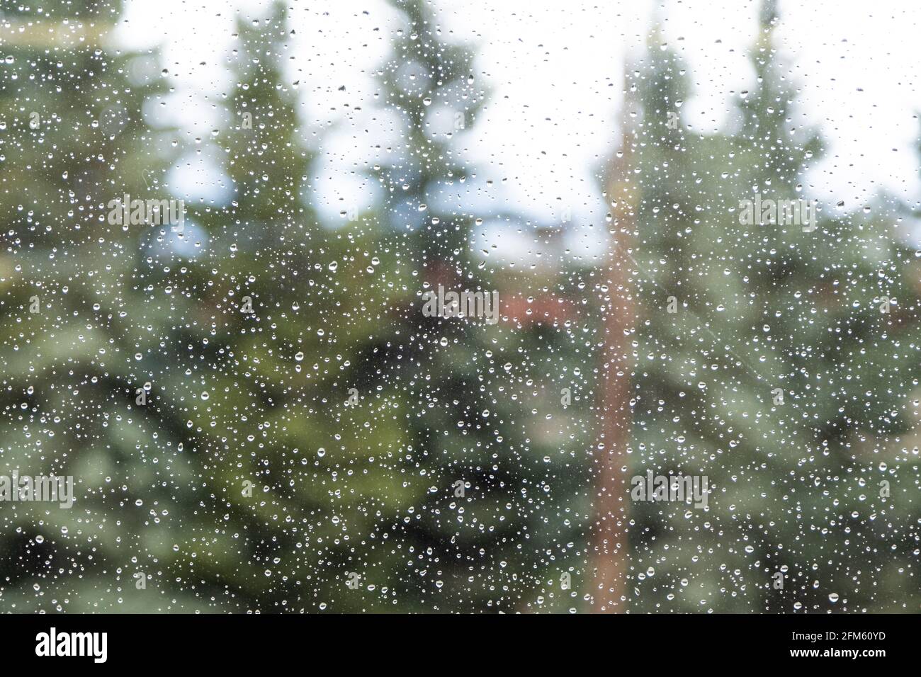 Raindrops falling at the window hi-res stock photography and images - Alamy