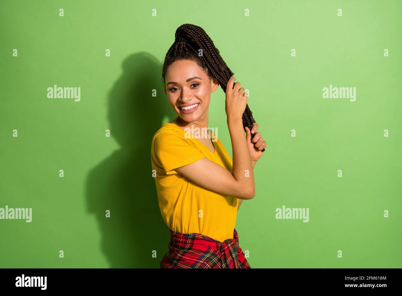 Photo of charming shiny dark skin lady dressed yellow t-shirt hands arm ...