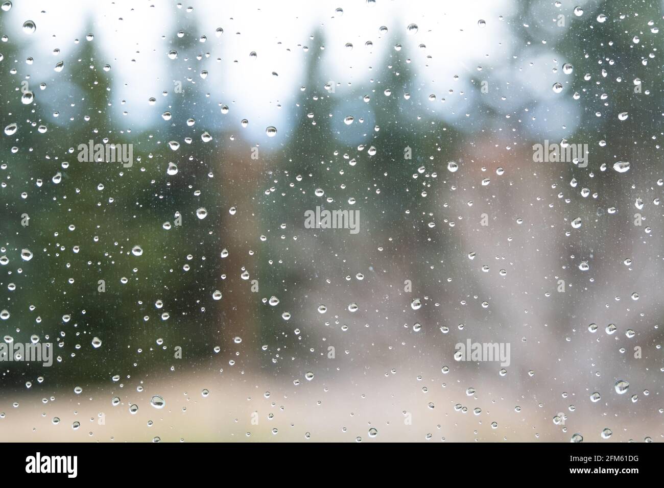 Raindrops falling at the window hi-res stock photography and images - Alamy