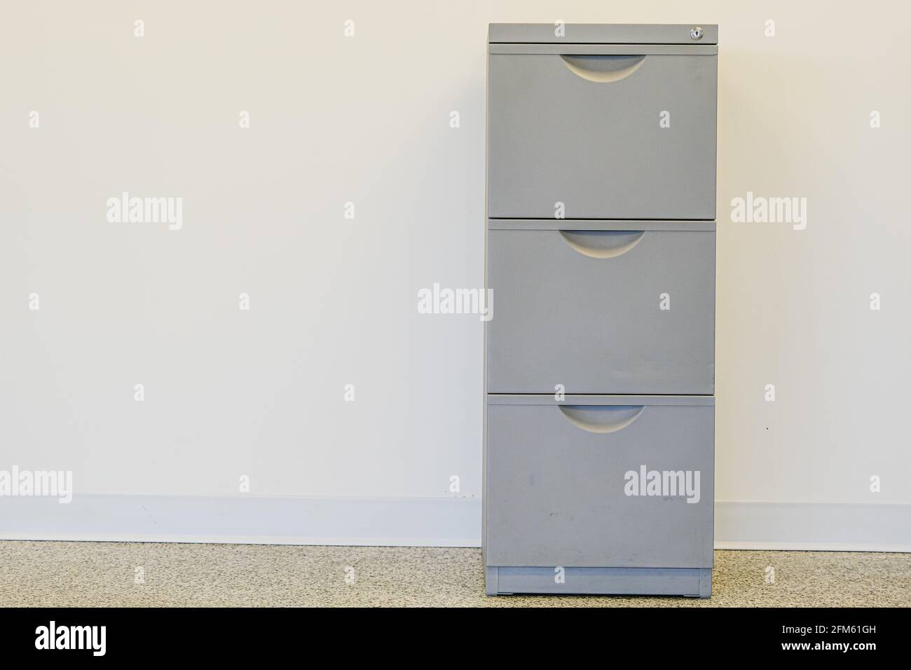 3 drawer filing cabinet in Office for keeping records Stock Photo - Alamy