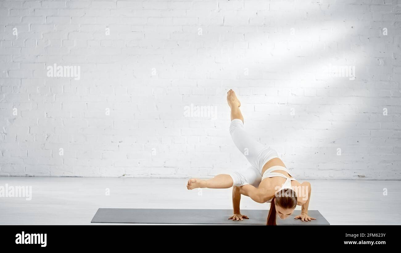 Balancing on hands hi-res stock photography and images - Alamy