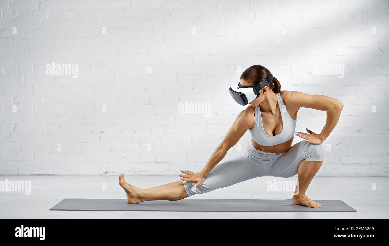 Barefoot woman in vr headset hi-res stock photography and images - Alamy