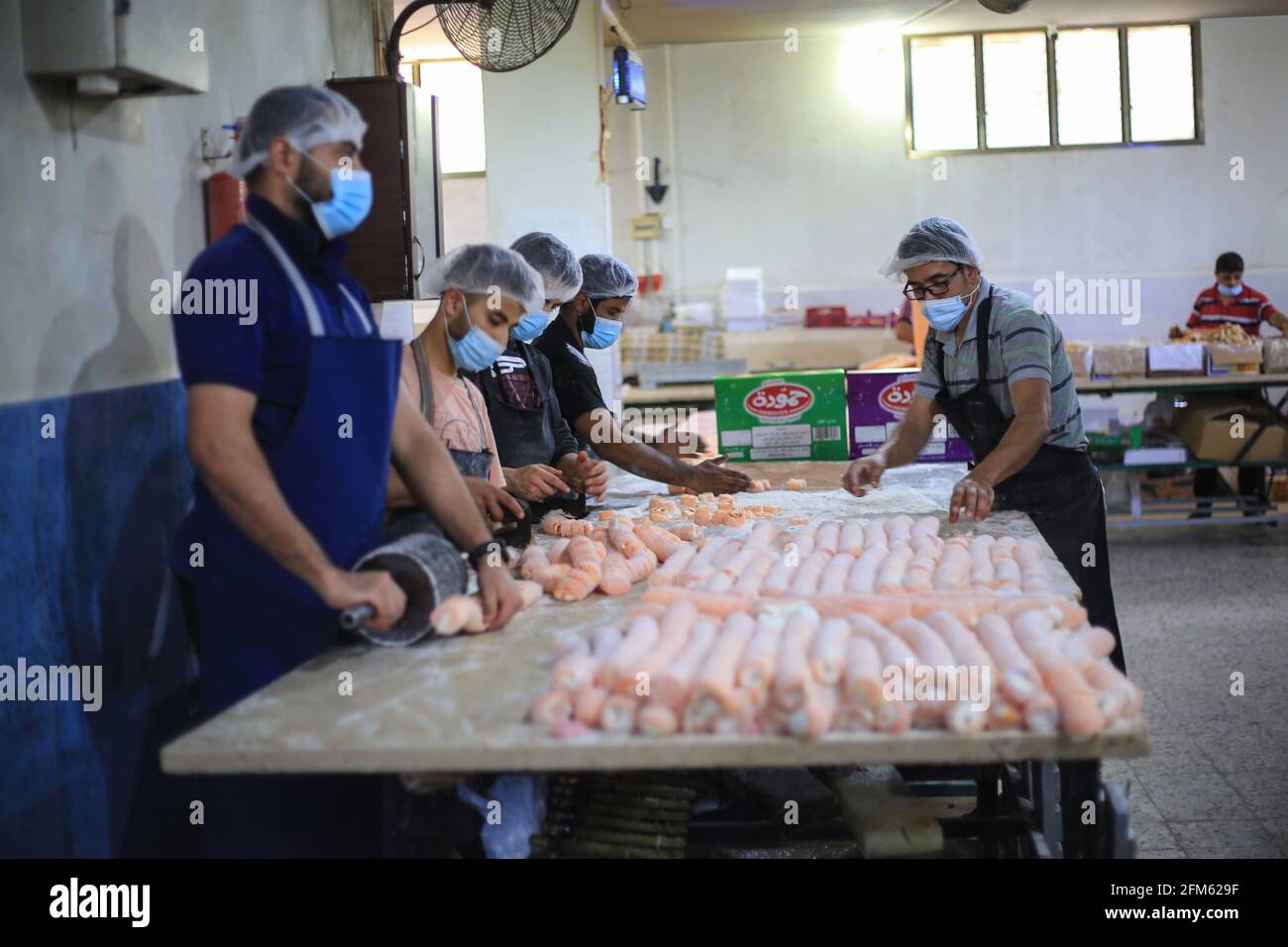 Al Burij camp, The Gaza Strip, Palestine. 5th May, 2021. Palestinians ...