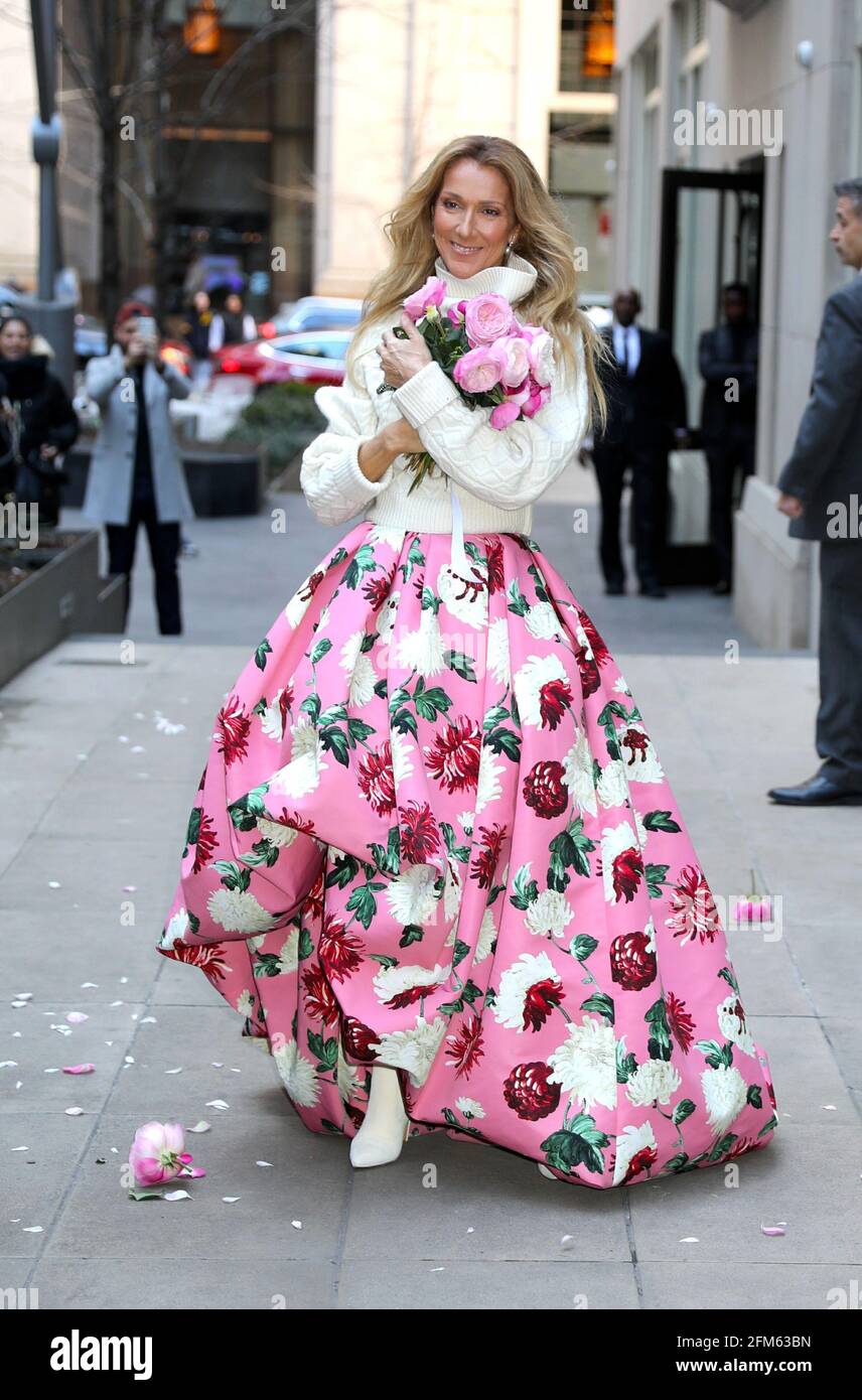 New York - NY - 20200308 Celine Dion throws a bouquet of flowers to one ...