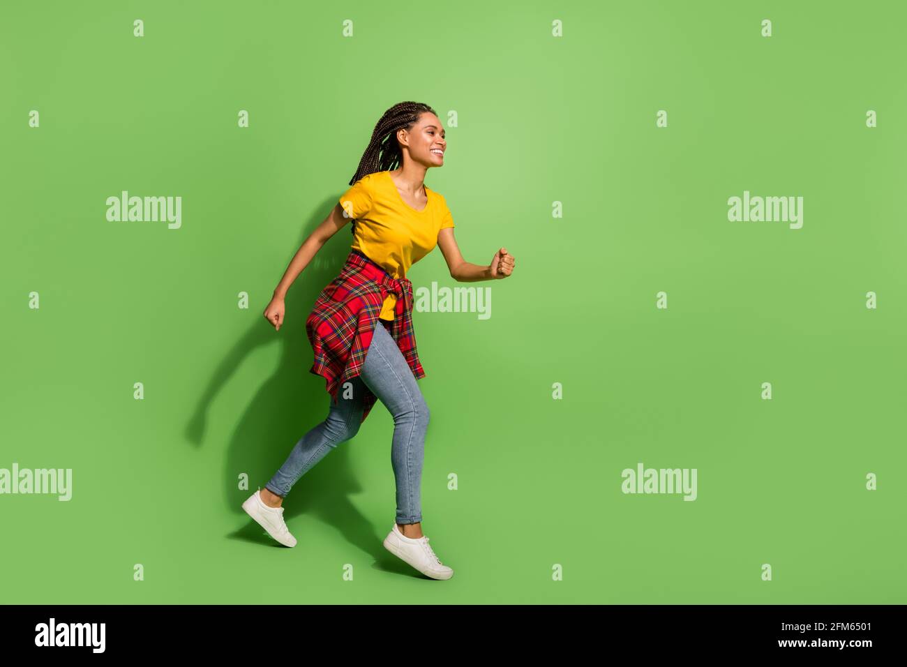 Full length body size view of lovely cheerful girl jumping running fast ...