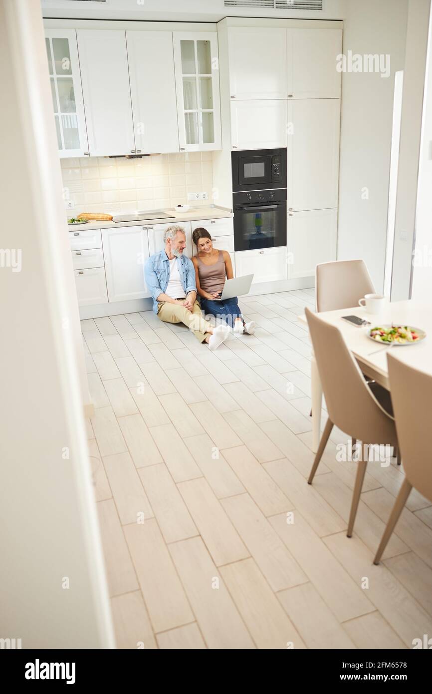 Mature couple at home from distance hi-res stock photography and images ...
