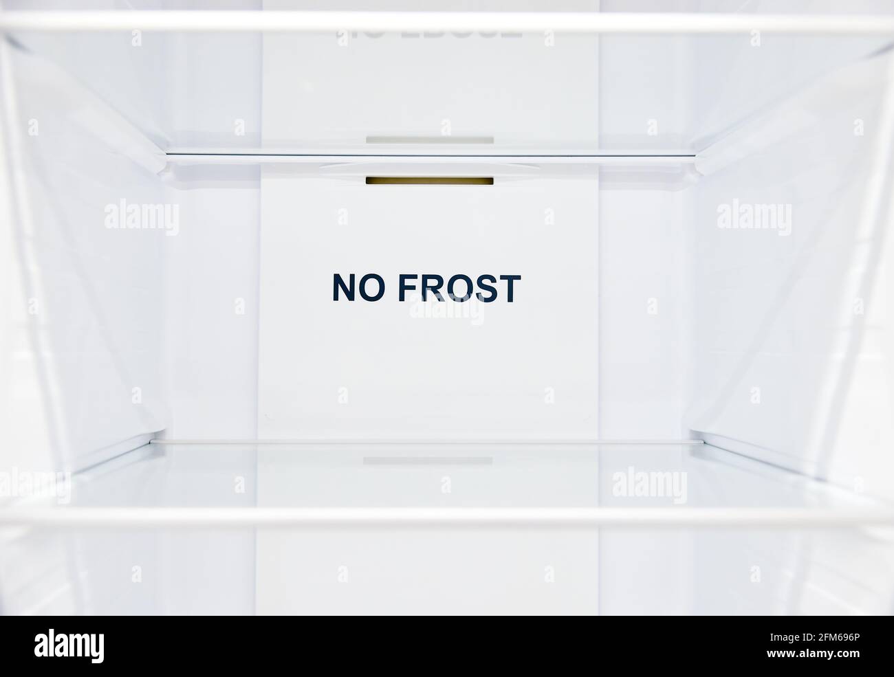 An empty refrigerator. Inside an empty, clean no frost refrigerator, a ...