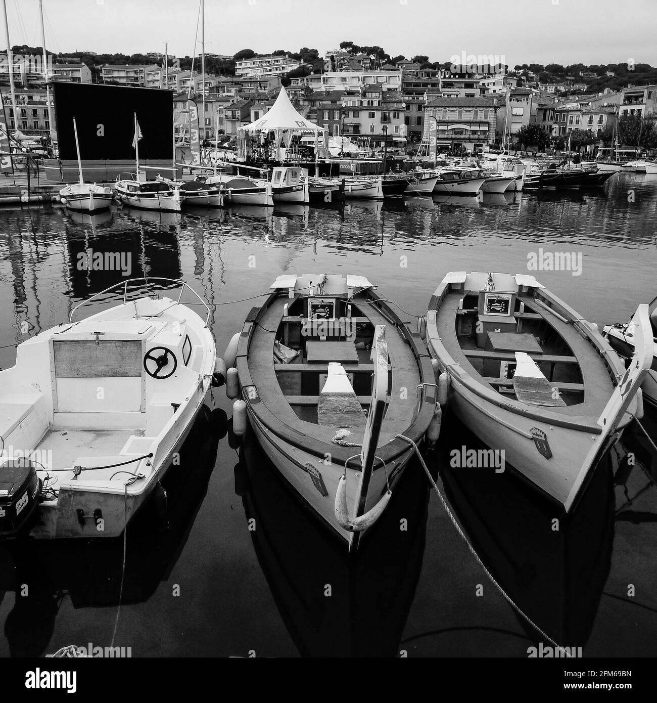 Small boats at quay in the fishing harbor, B&W photography, Cassis ...