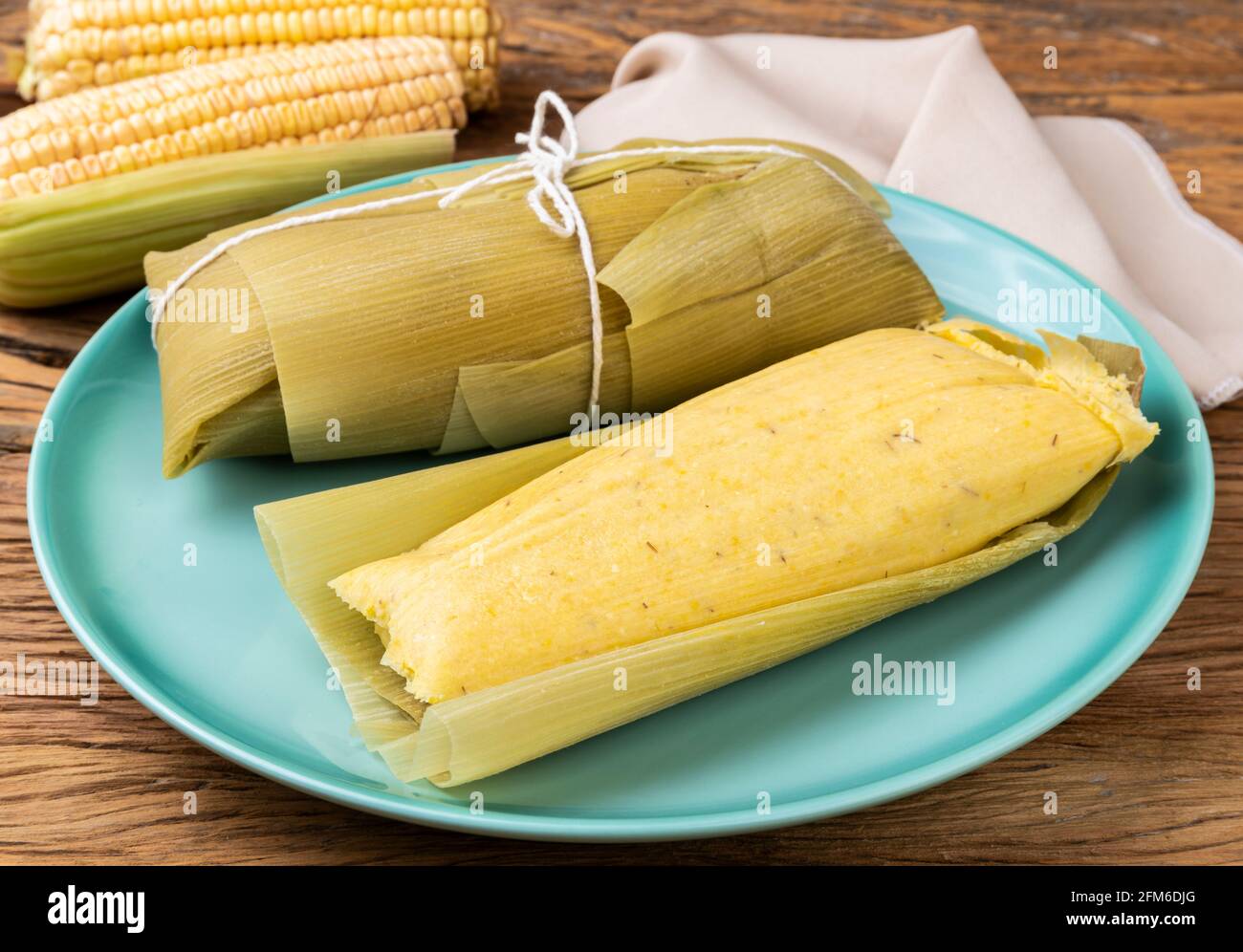 Pamonha, typical brazilian corn food. June festival food Stock Photo ...