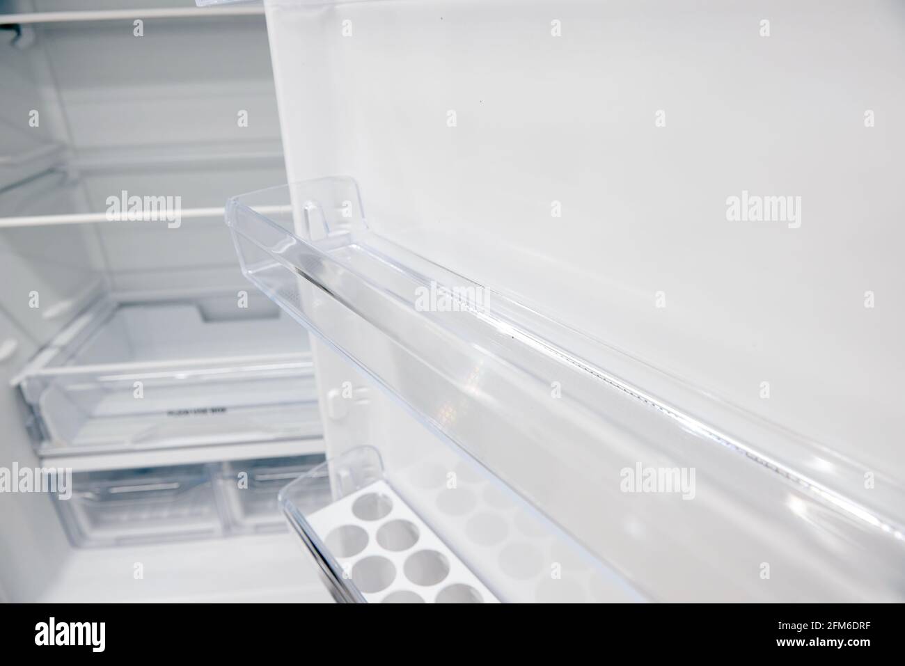 An empty refrigerator. Inside an empty, clean refrigerator, a ...