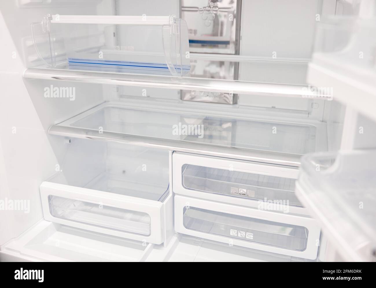 An empty refrigerator. Inside an empty, clean refrigerator, a ...