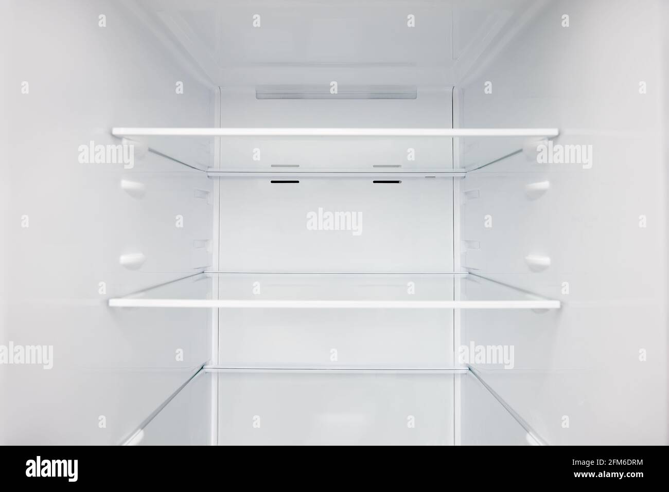 An empty refrigerator. Inside an empty, clean refrigerator, a ...