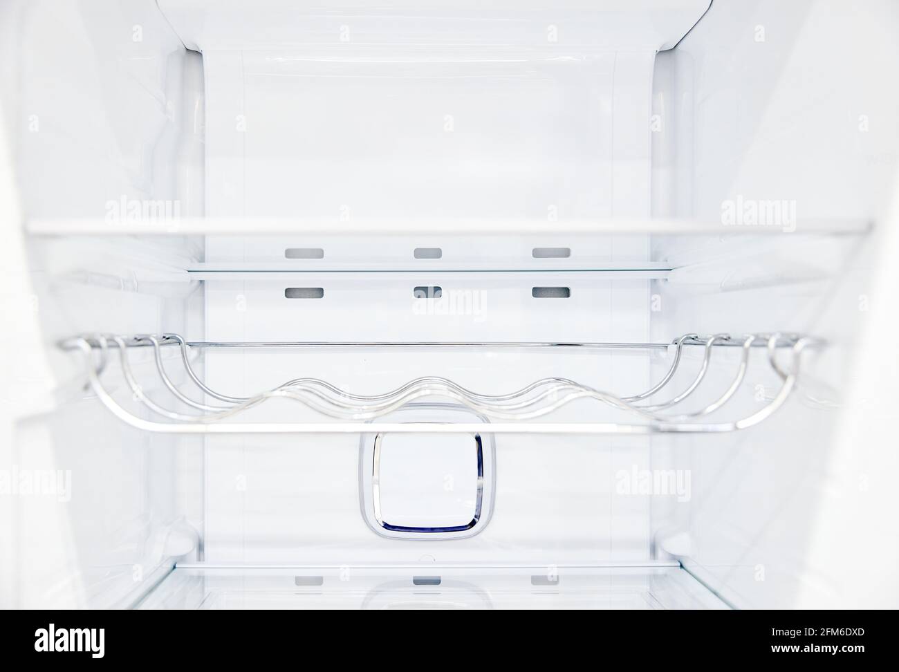 An empty refrigerator. Inside an empty, clean refrigerator, a ...
