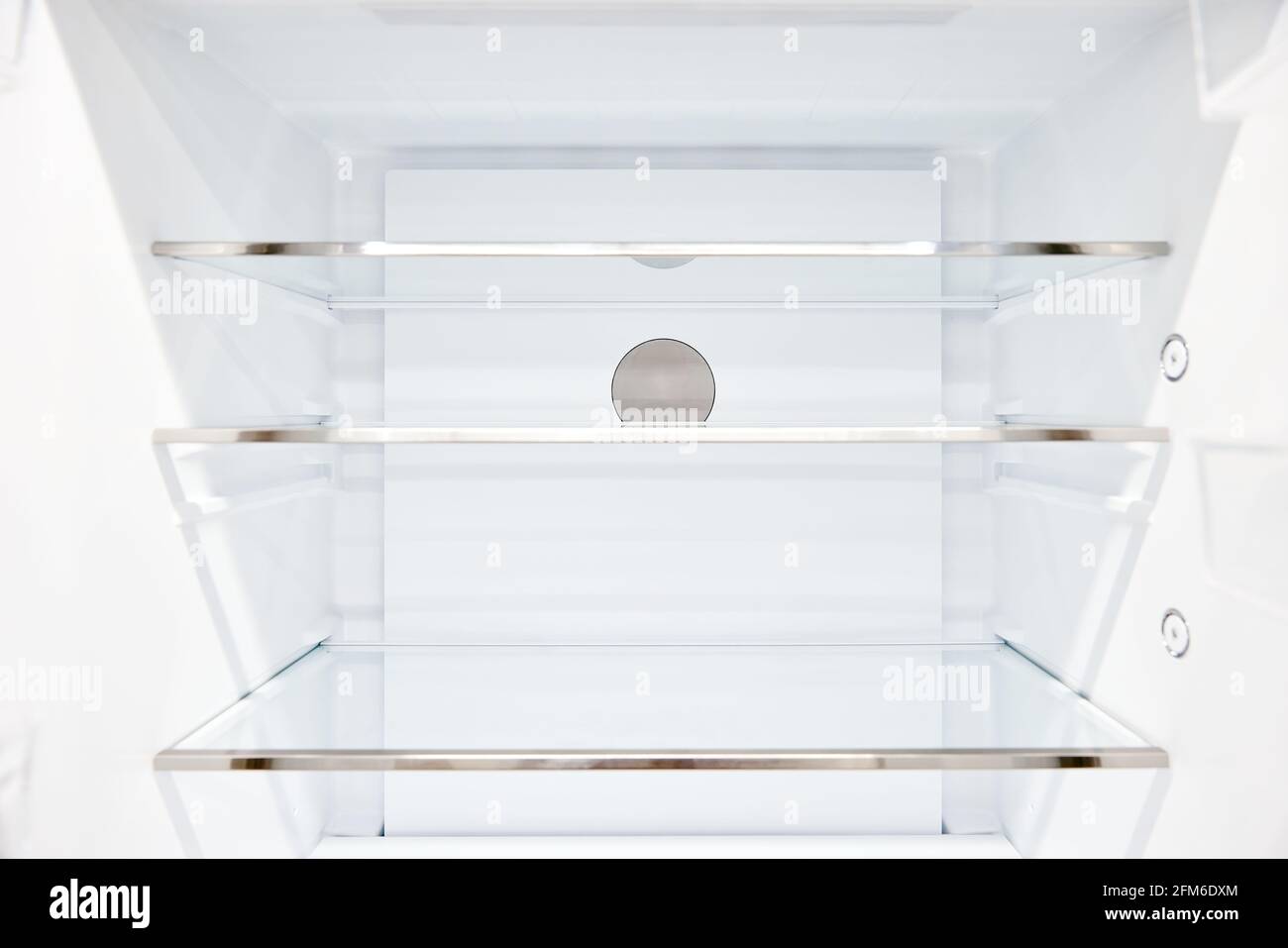 An empty refrigerator. Inside an empty, clean refrigerator, a ...