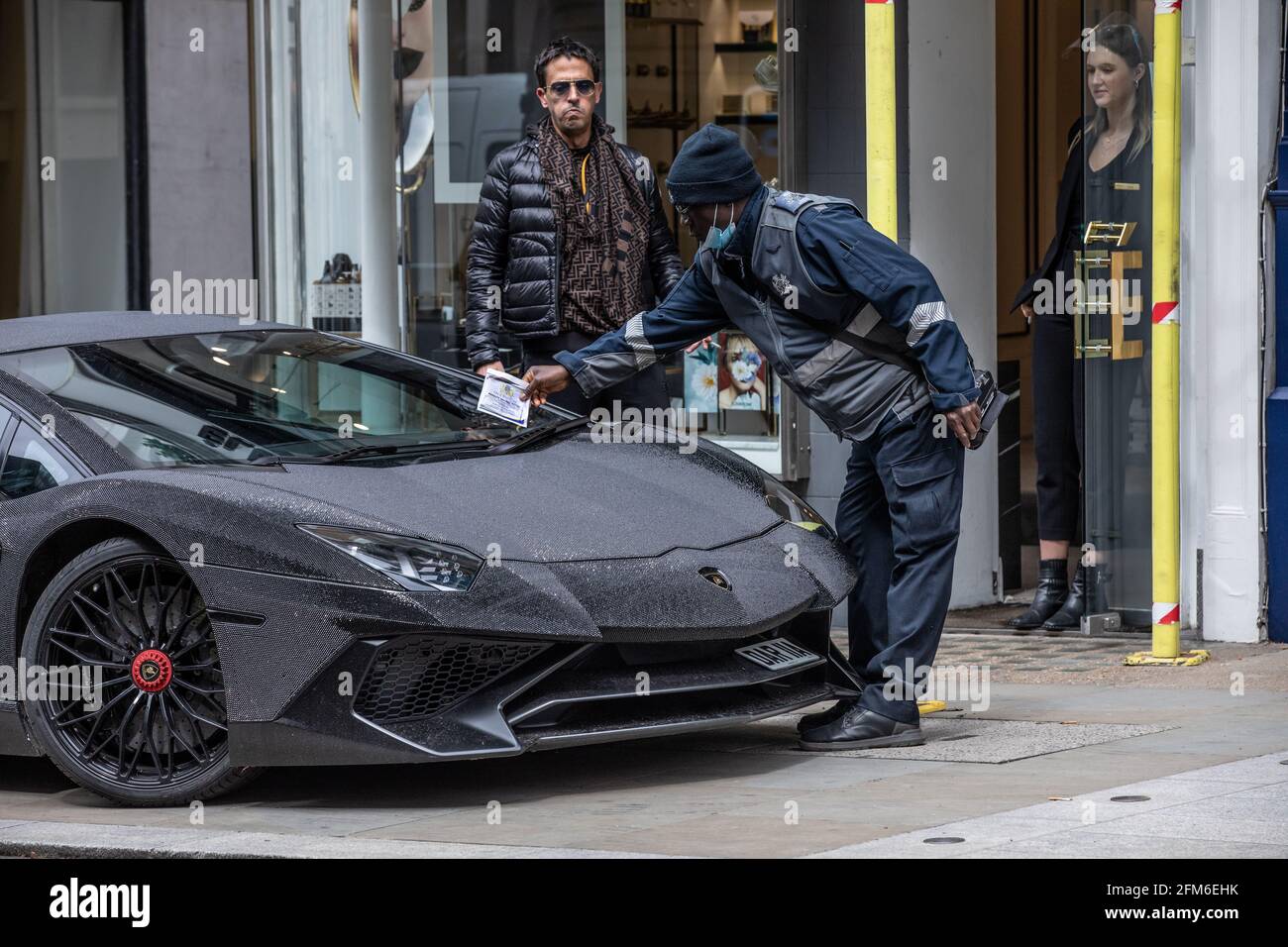 Daria Radionova gets a parking ticket on her Lamborghini whilst parked ...