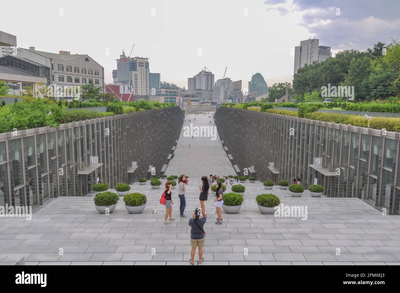 People walking on Ewha Campus Complex valley on a humid midsummer day ...