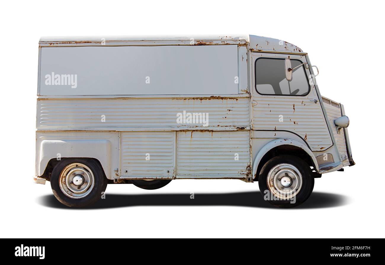 Old French van side view isolated on white background Stock Photo - Alamy