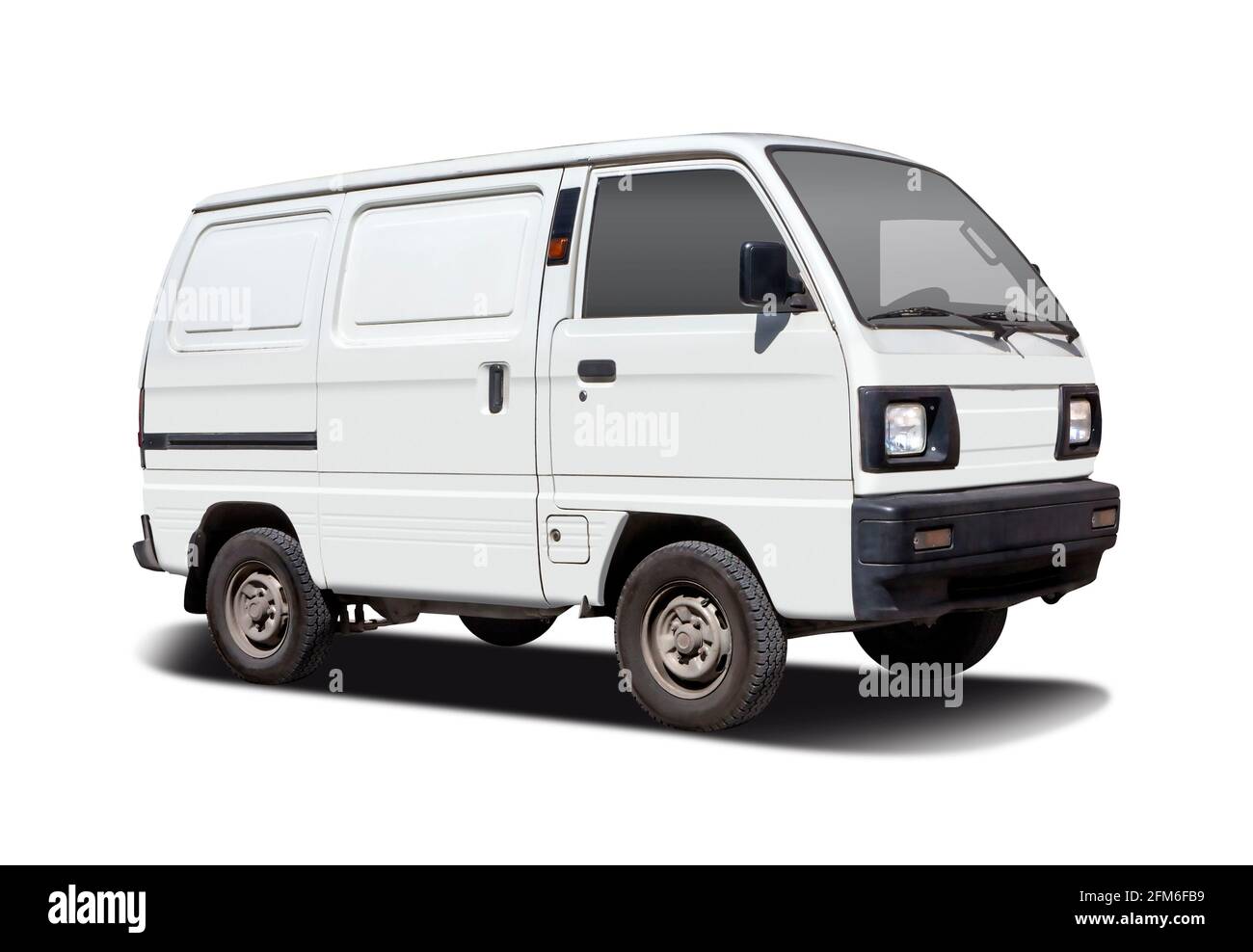 White van side view isolated on white background Stock Photo - Alamy