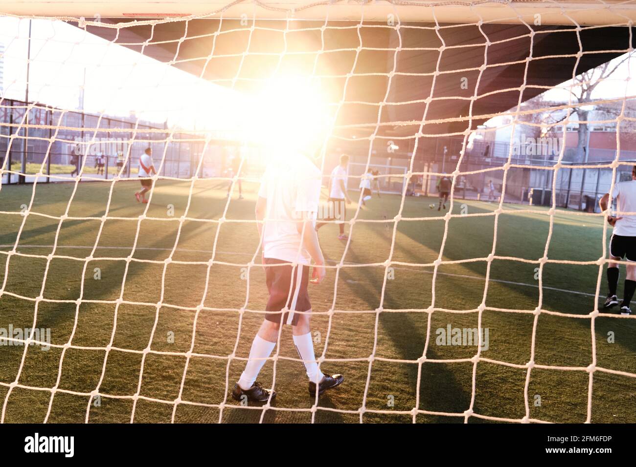 Soccer game at sunset hi-res stock photography and images - Alamy