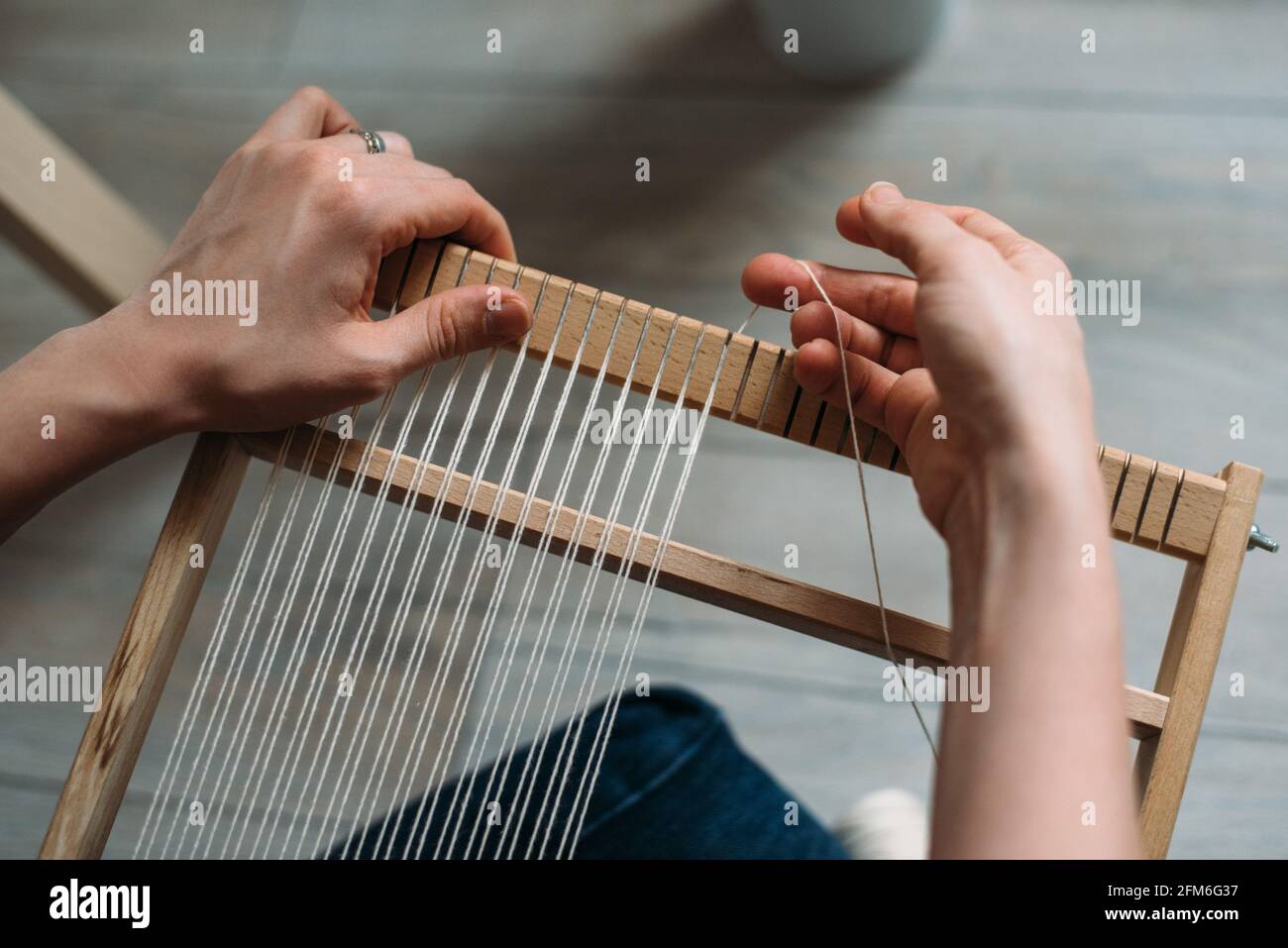 Close up woman weaving hi-res stock photography and images - Alamy