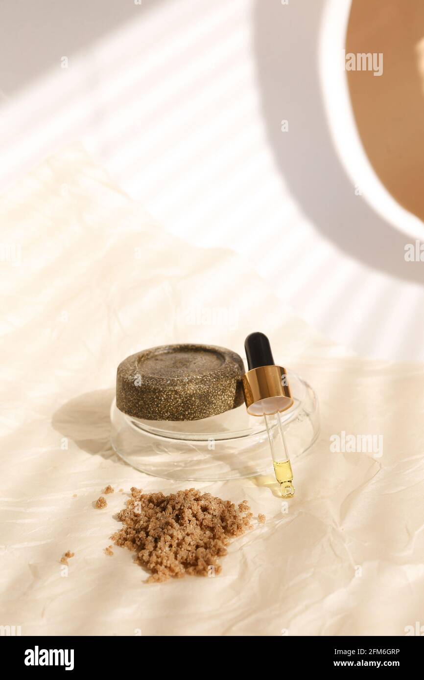 Soap, pipette and scrub texture Stock Photo - Alamy