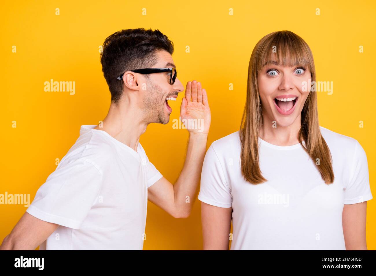 Photo of impressed persons dressed t-shirt open mouth arm mouth making ...
