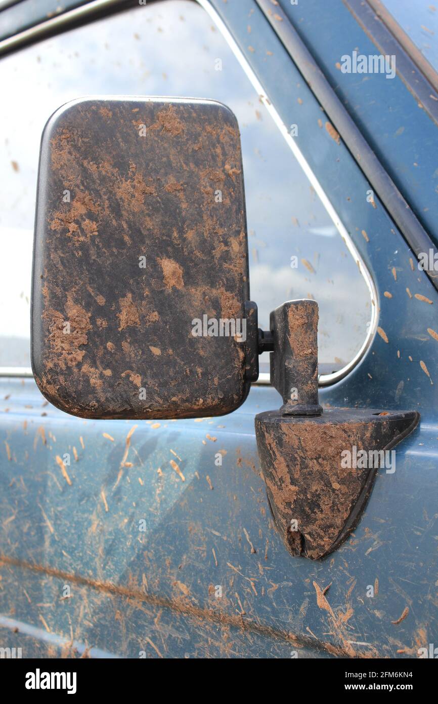 Close-up mud-splattered SUV side mirror Stock Photo - Alamy