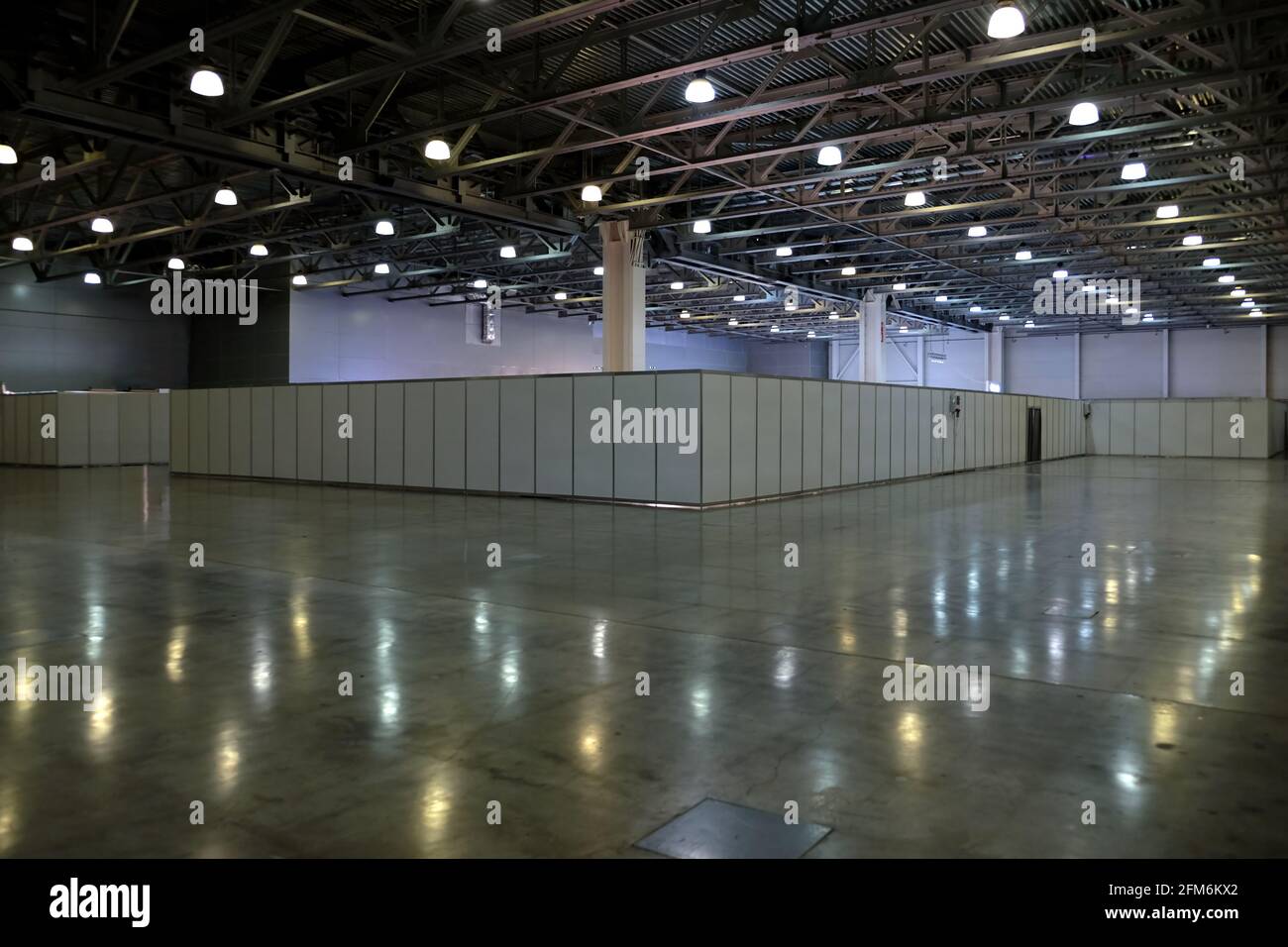 Large empty exhibition hall interior in an industrial building with ...