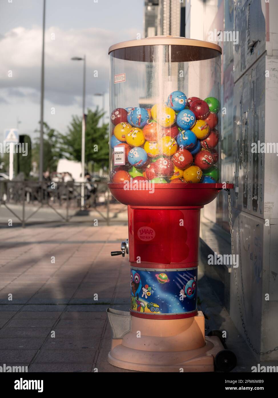 capsule toy dispenser machine in a city street Stock Photo - Alamy
