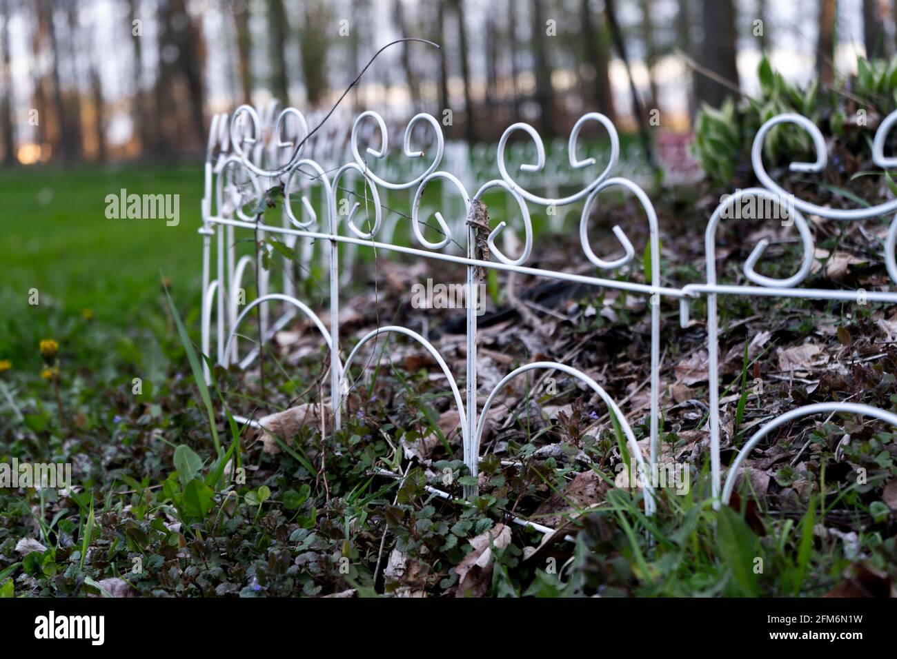Beautiful white garden fencing Stock Photo - Alamy