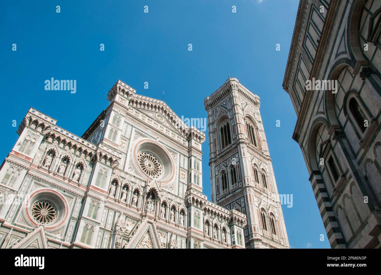 The typical Italian Gothic building, the Cathedral of Florence, is ...