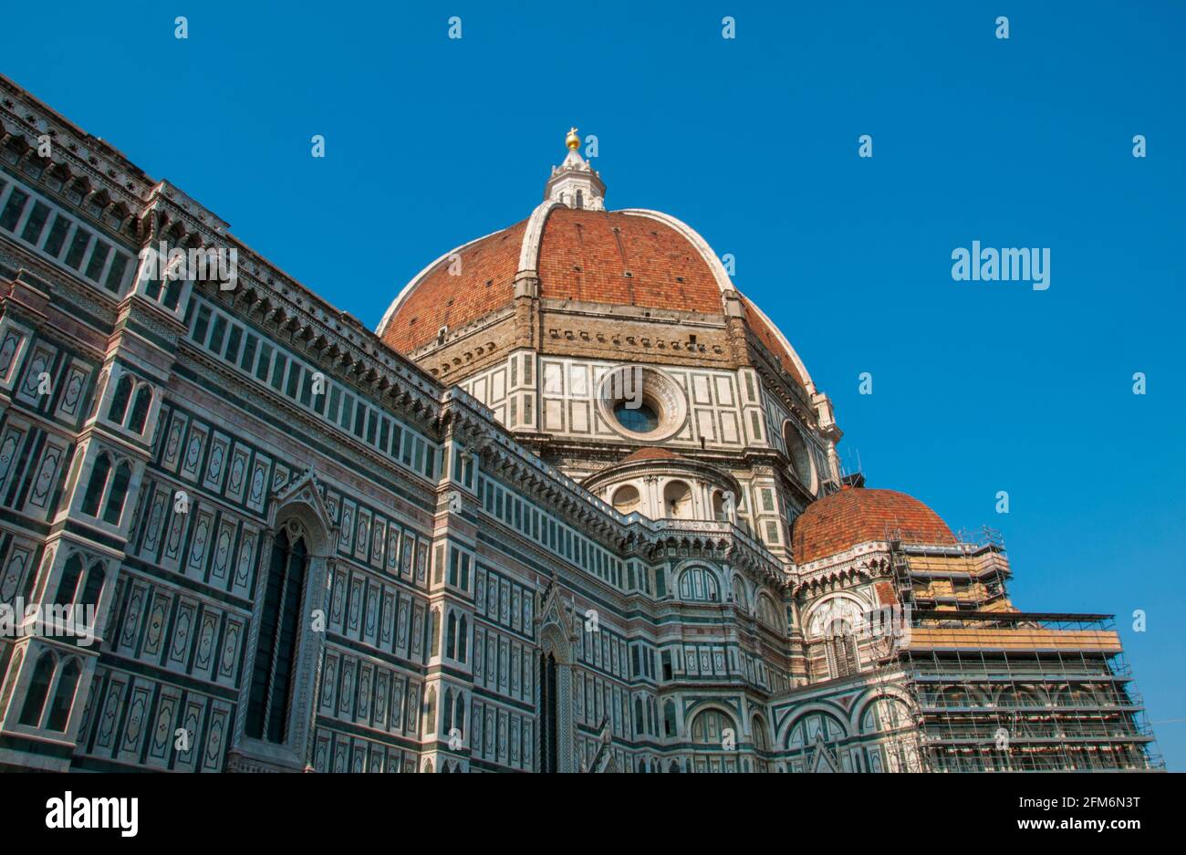 The typical Italian Gothic building, the Cathedral of Florence, is ...