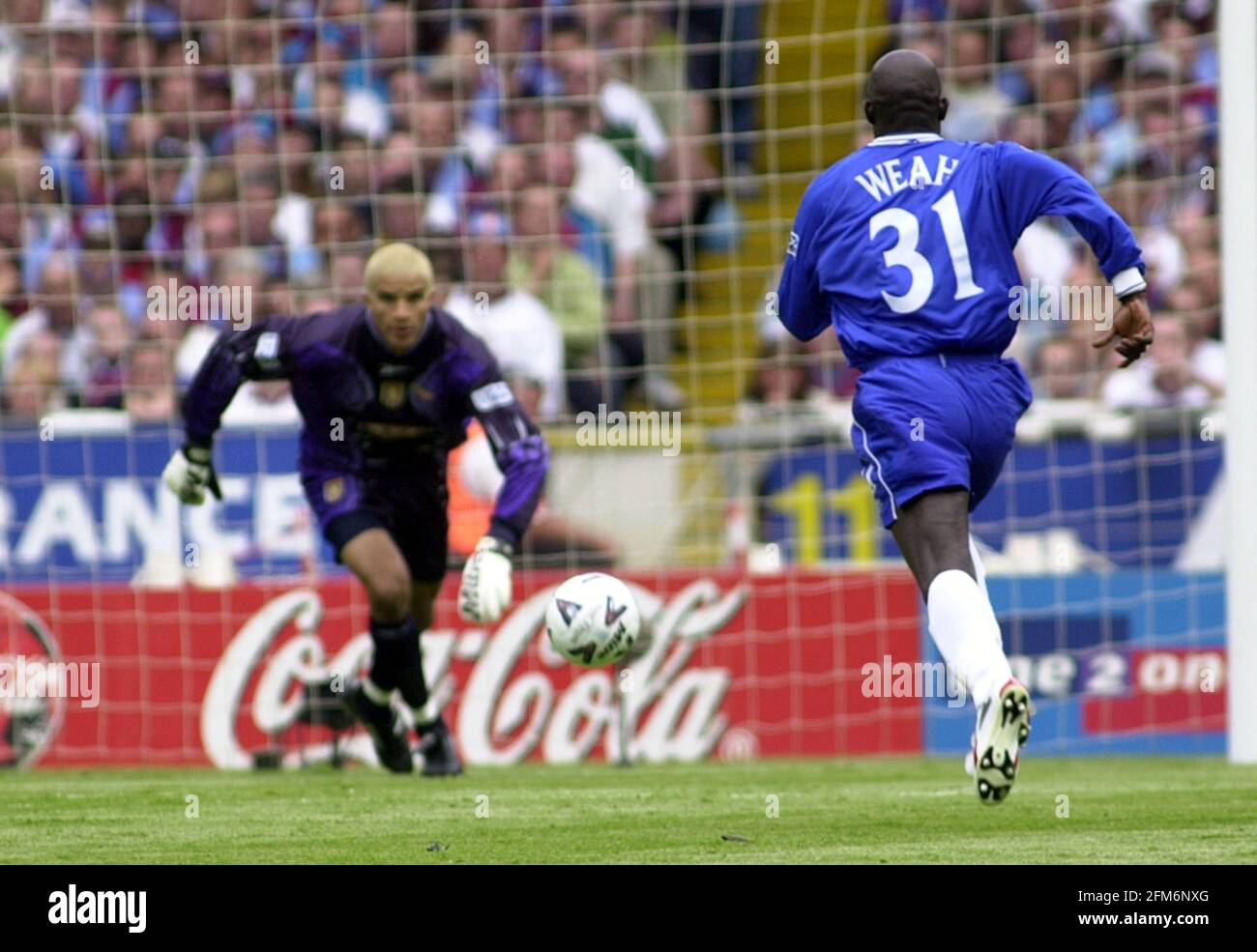 George Weah Football player of Chelsea, May 2000 makes a run towards ...