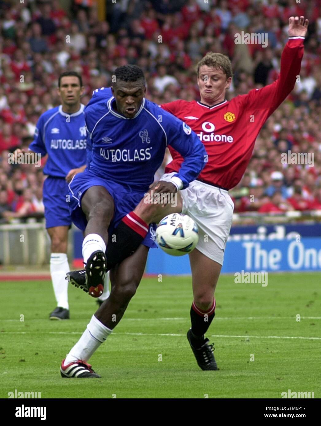 Manchester United's Ole Gunnar Solskjaer and Marcel Desailly of Chelsea ...