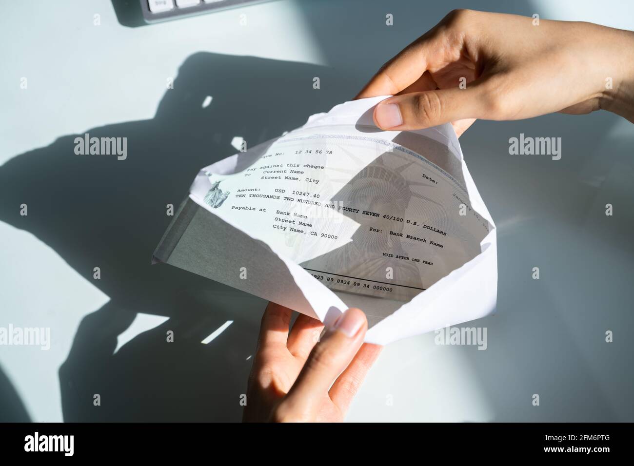 Girl handing envelope hi-res stock photography and images - Alamy