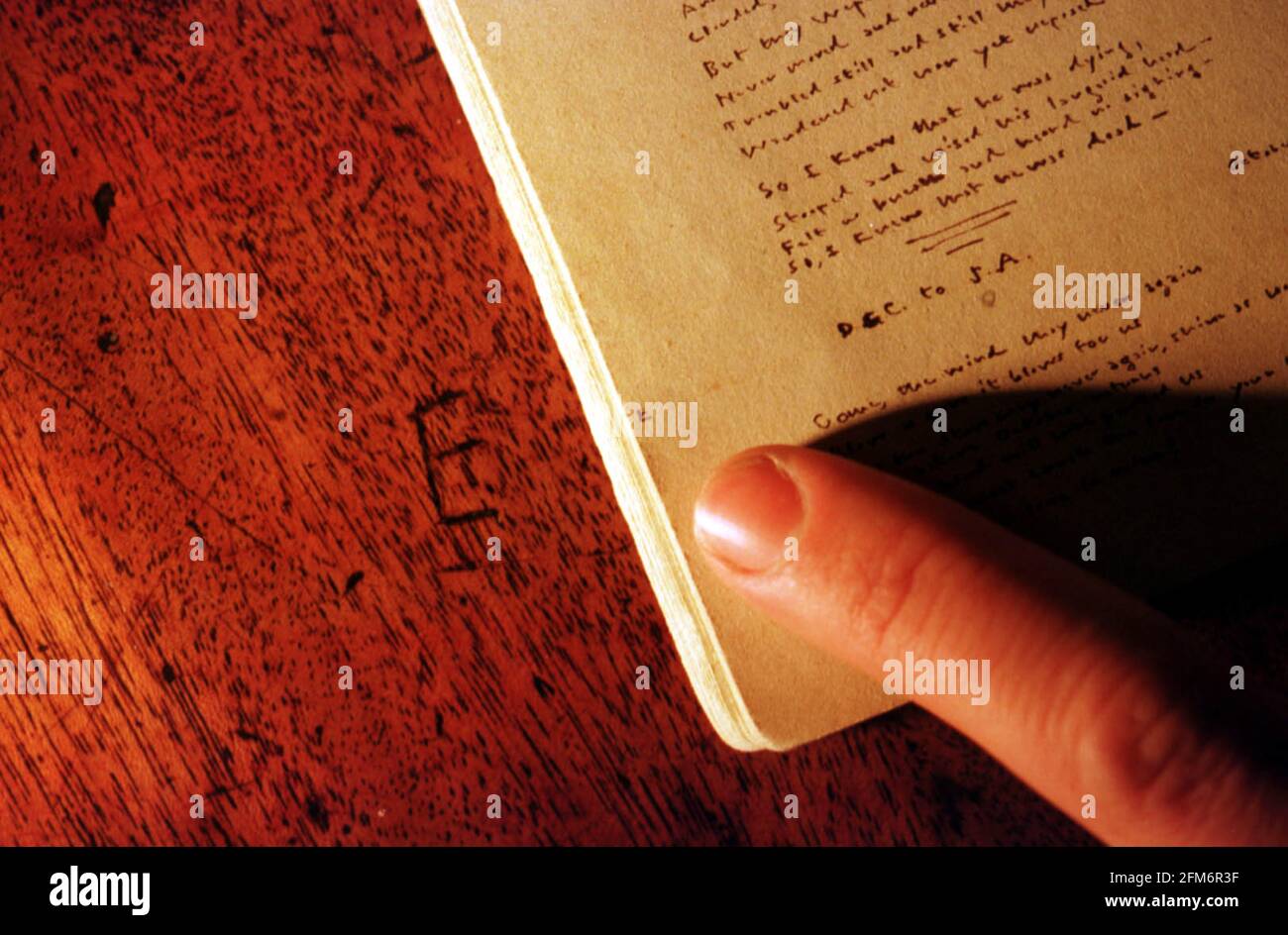 An E carved into the desk or table used by the Bronte sisters. the book ...