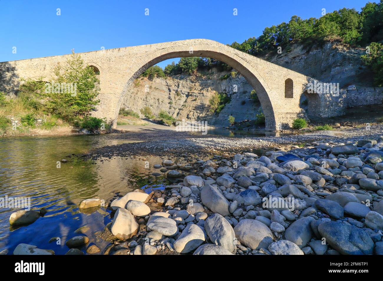 Old stone bridge of Aziz Aga, Venetikos river, Grevena, Macedonia ...